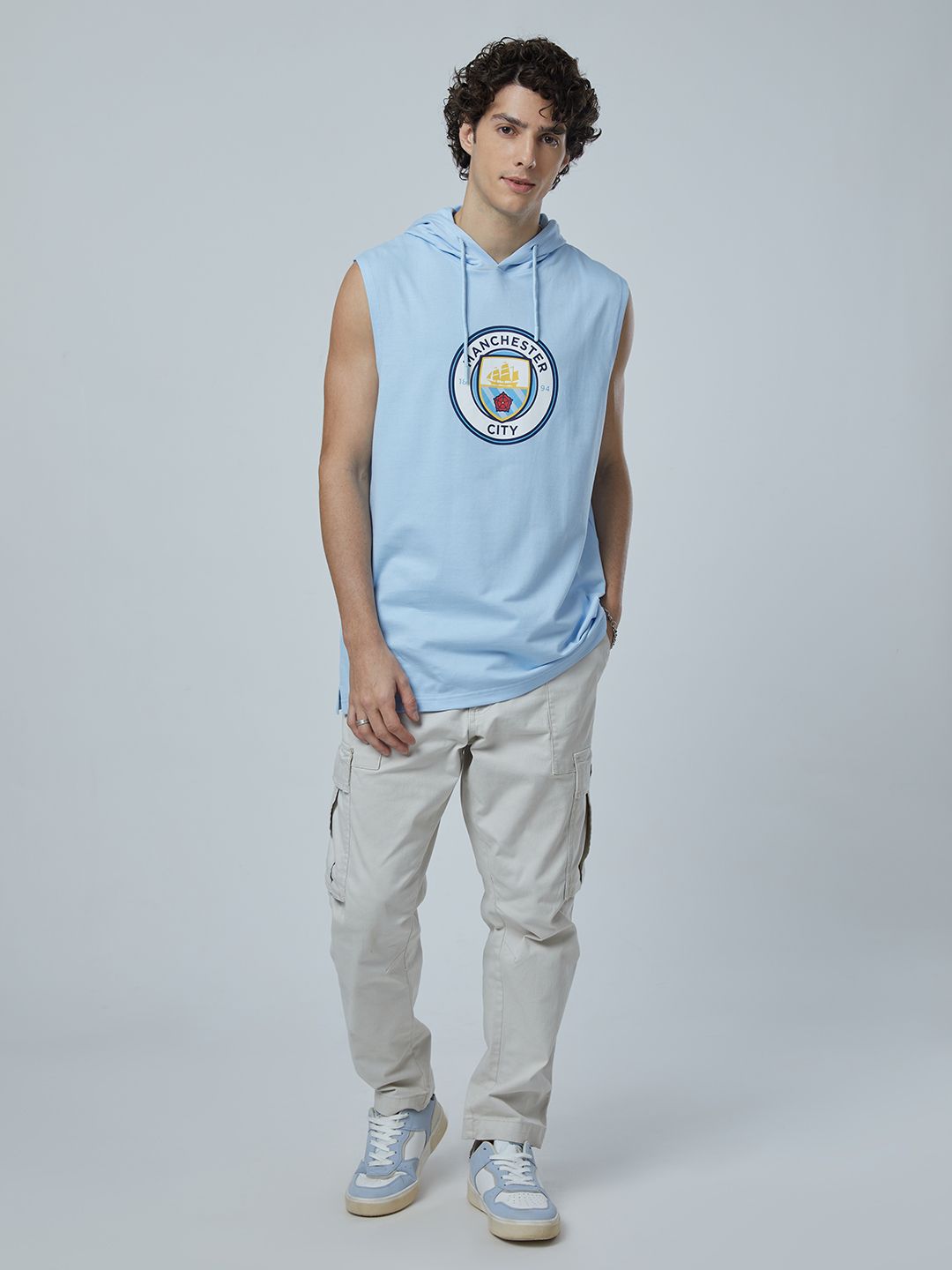 Buy Manchester City: Crest Hooded Vest For Men Online.