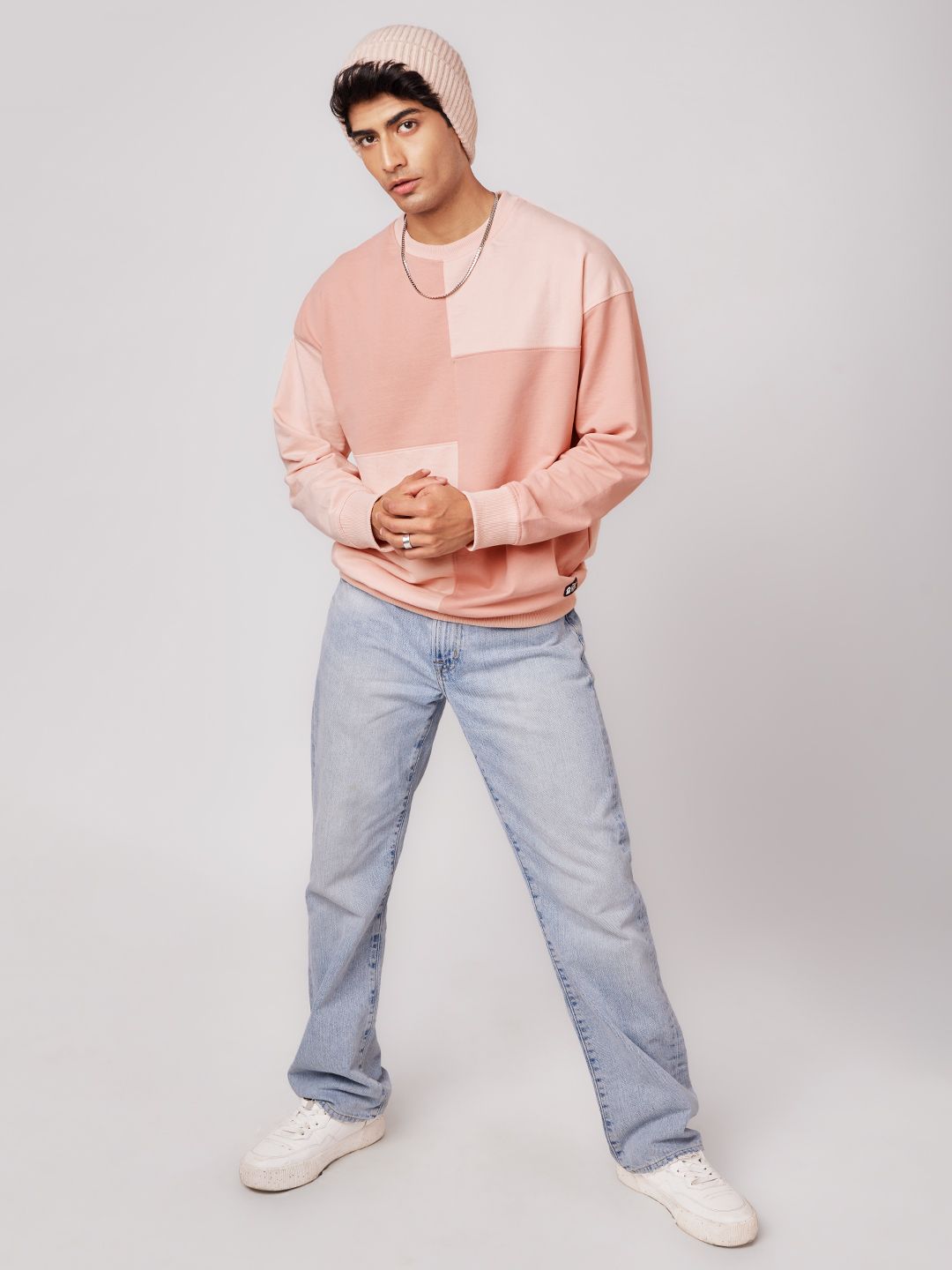 Buy Solids: Pastel Pink Colour Block Men Oversized Sweatshirts Online.