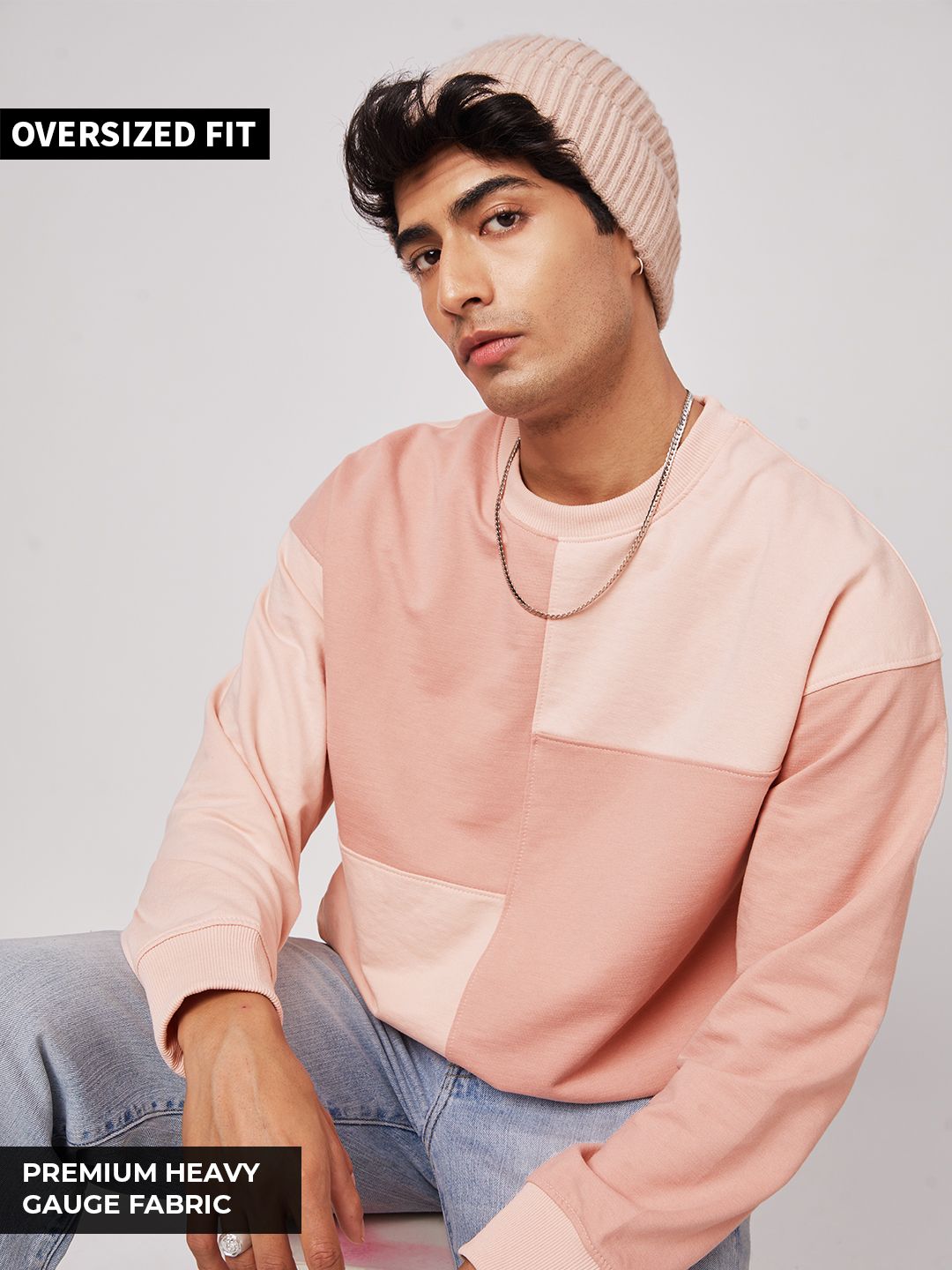 Buy Solids: Pastel Pink Colour Block Men Oversized Sweatshirts Online.