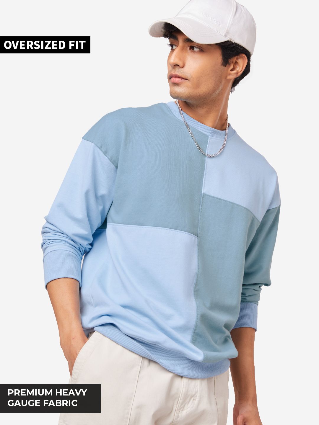 Buy Solids: Pastel Blue Colour Block Men Oversized Sweatshirts Online.